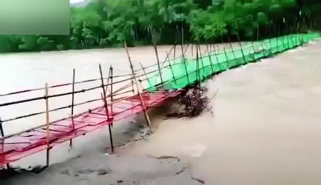 Woman just made it across failing bridge. | Scrolller