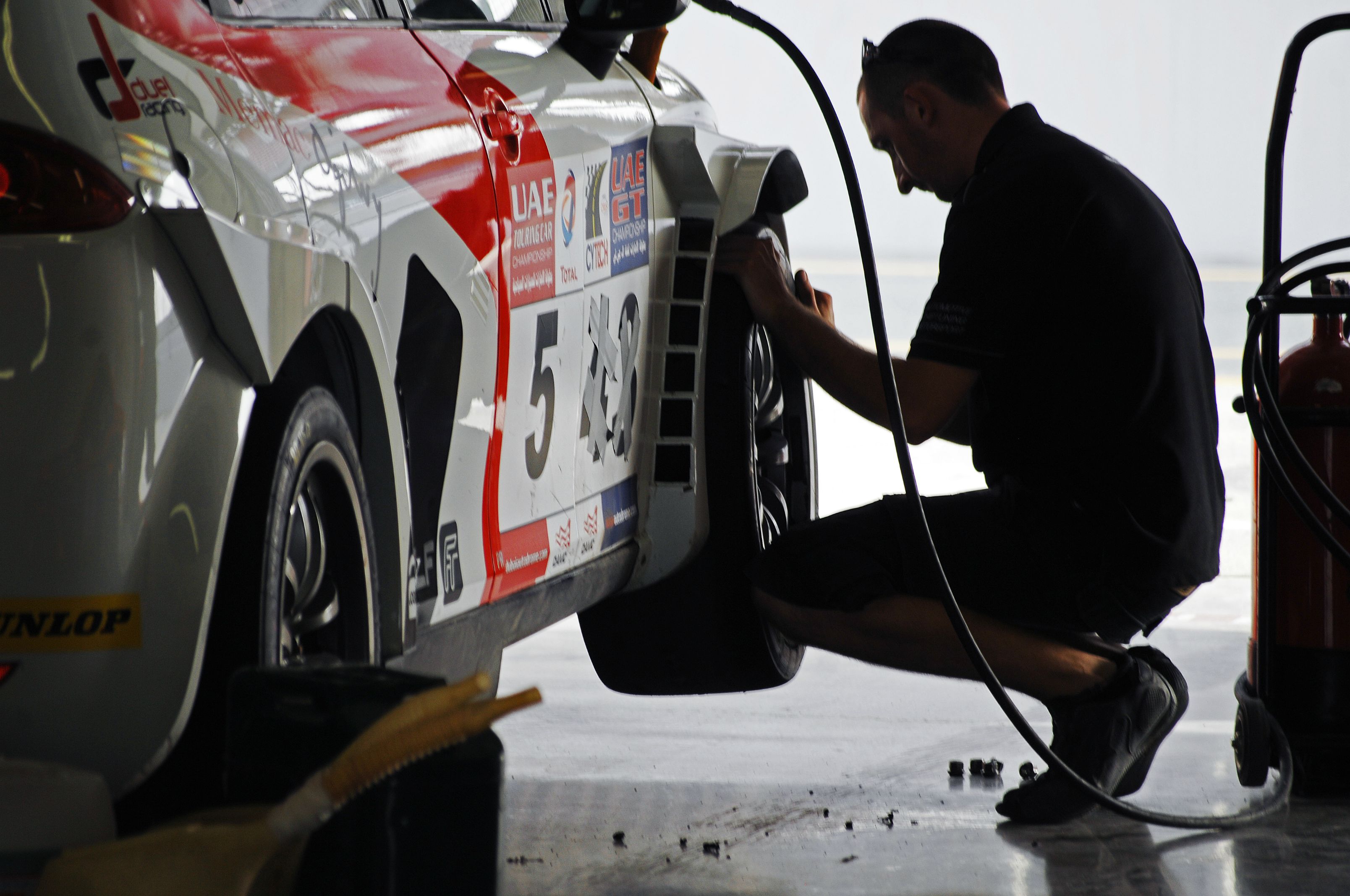 Working in the pits - pre race setup | Scrolller