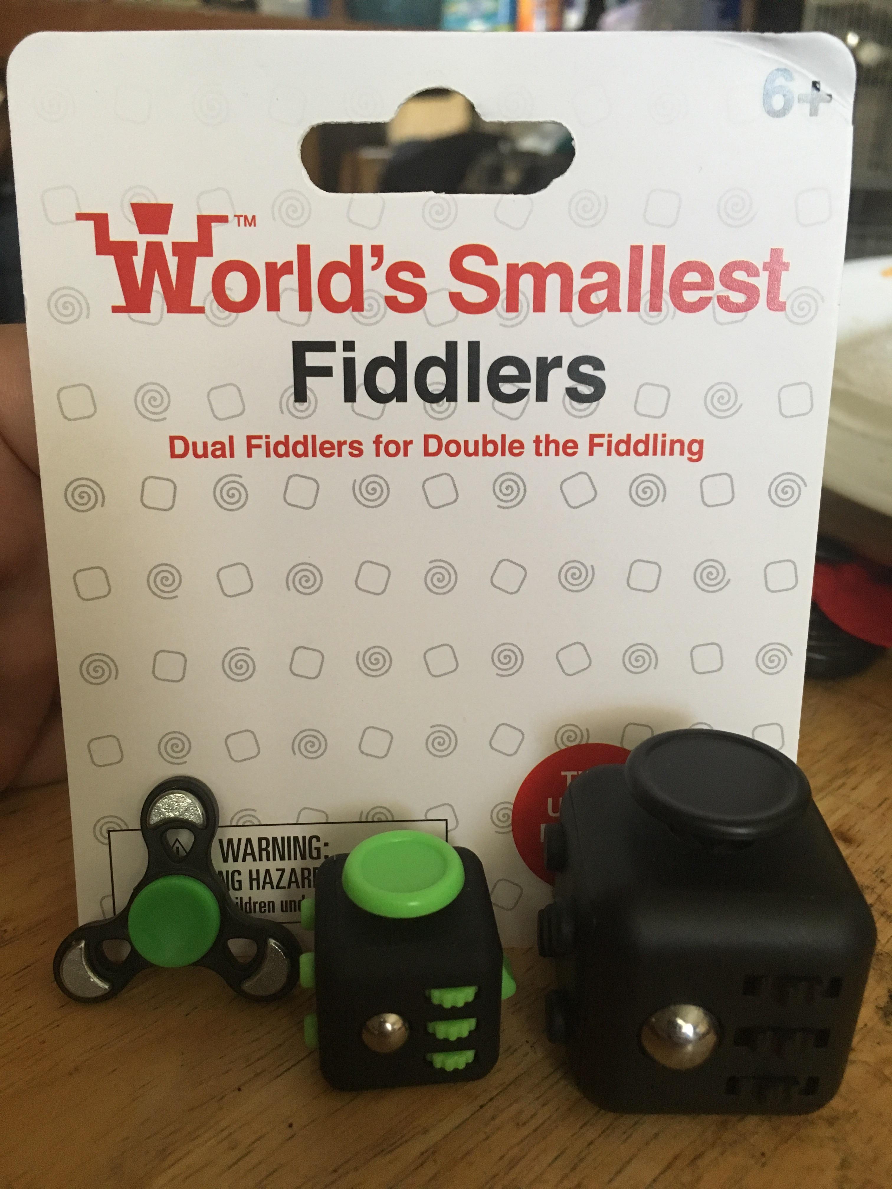 Worlds Smallest fidget cube and spinner (placed next to a regular cube for size reference ...