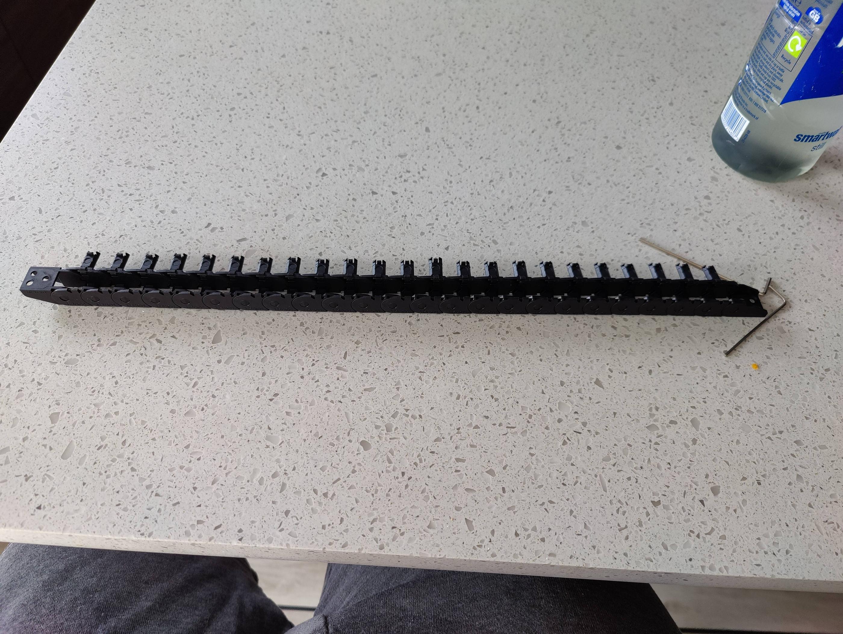 After struggling for more time than I would like to admit I discovered the cable chains open ...