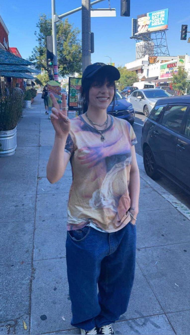 Billie on the sidewalk | Scrolller