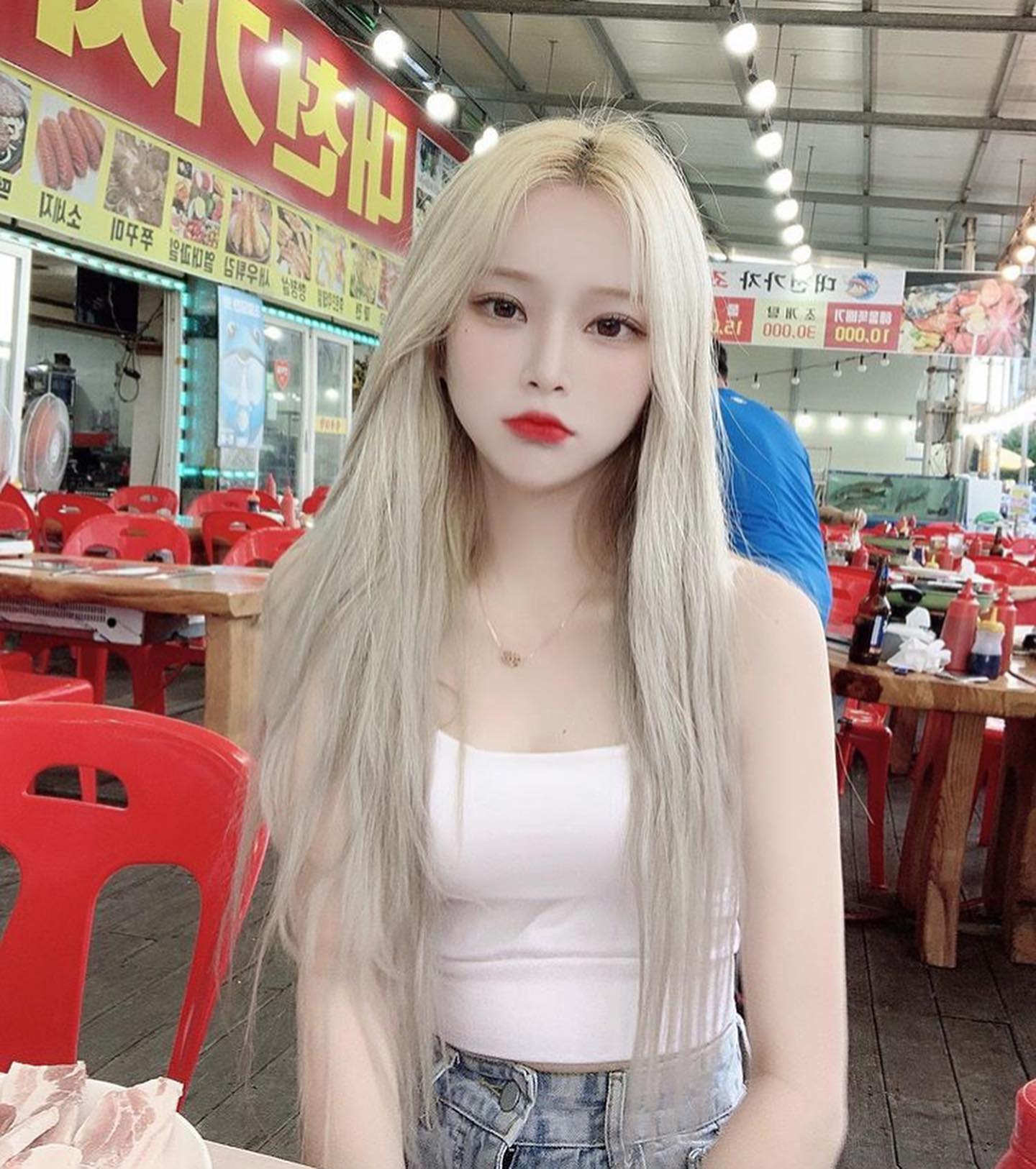 Blonde Asian Scrolller