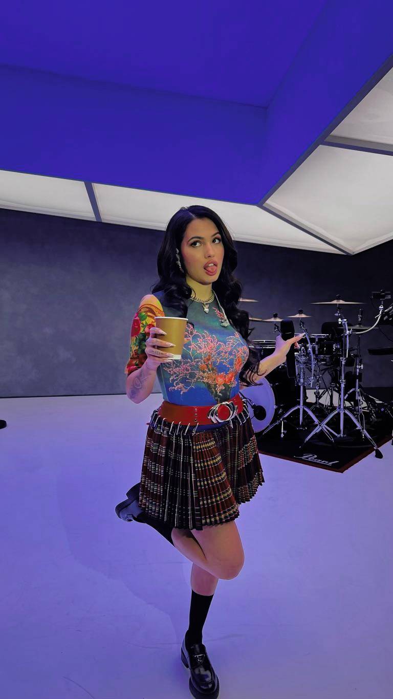 BTS pic from her live performance of Let Love Go, on YouTube | Scrolller