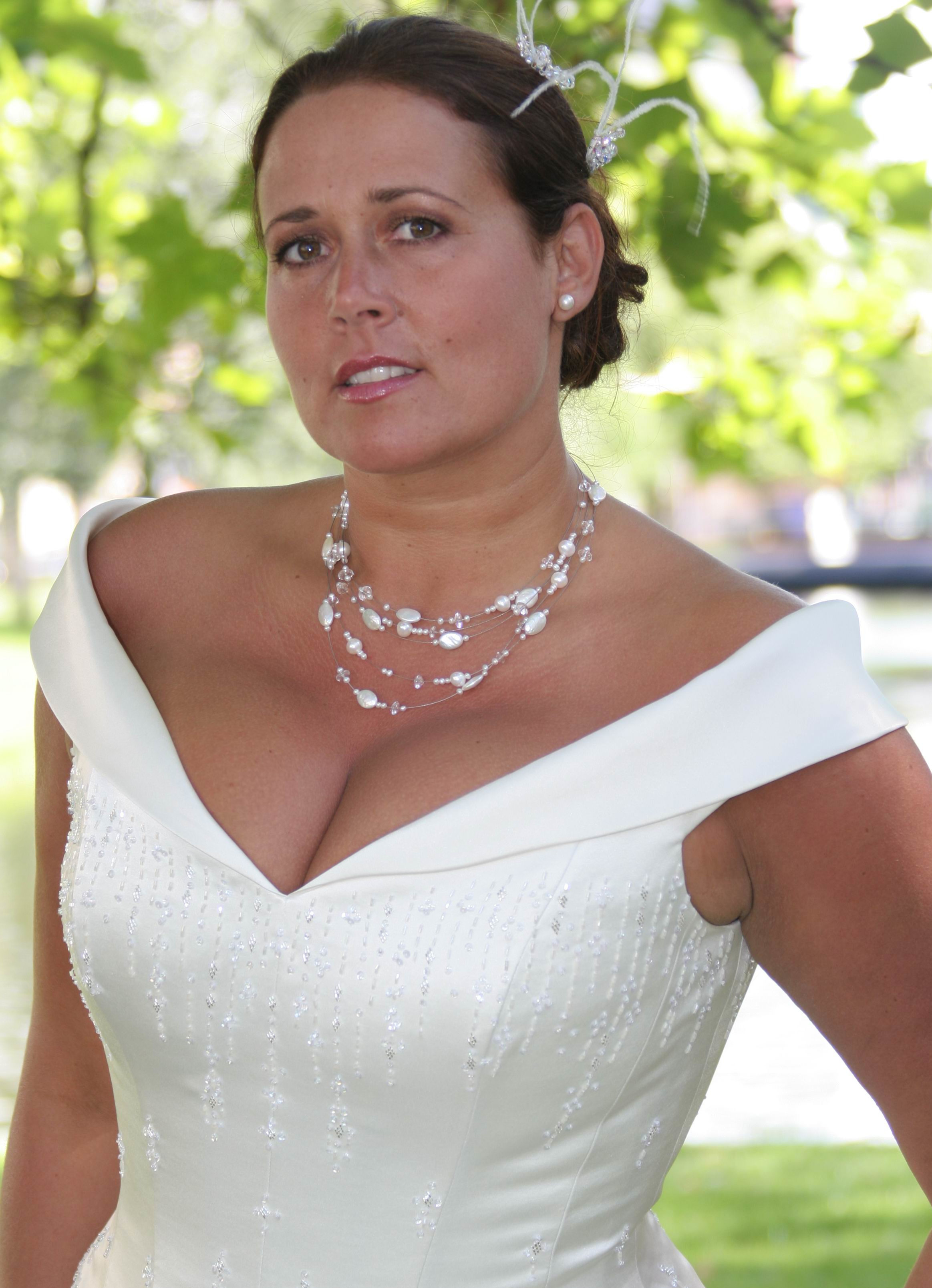 Busty Bride with big pushed Tits | Scrolller