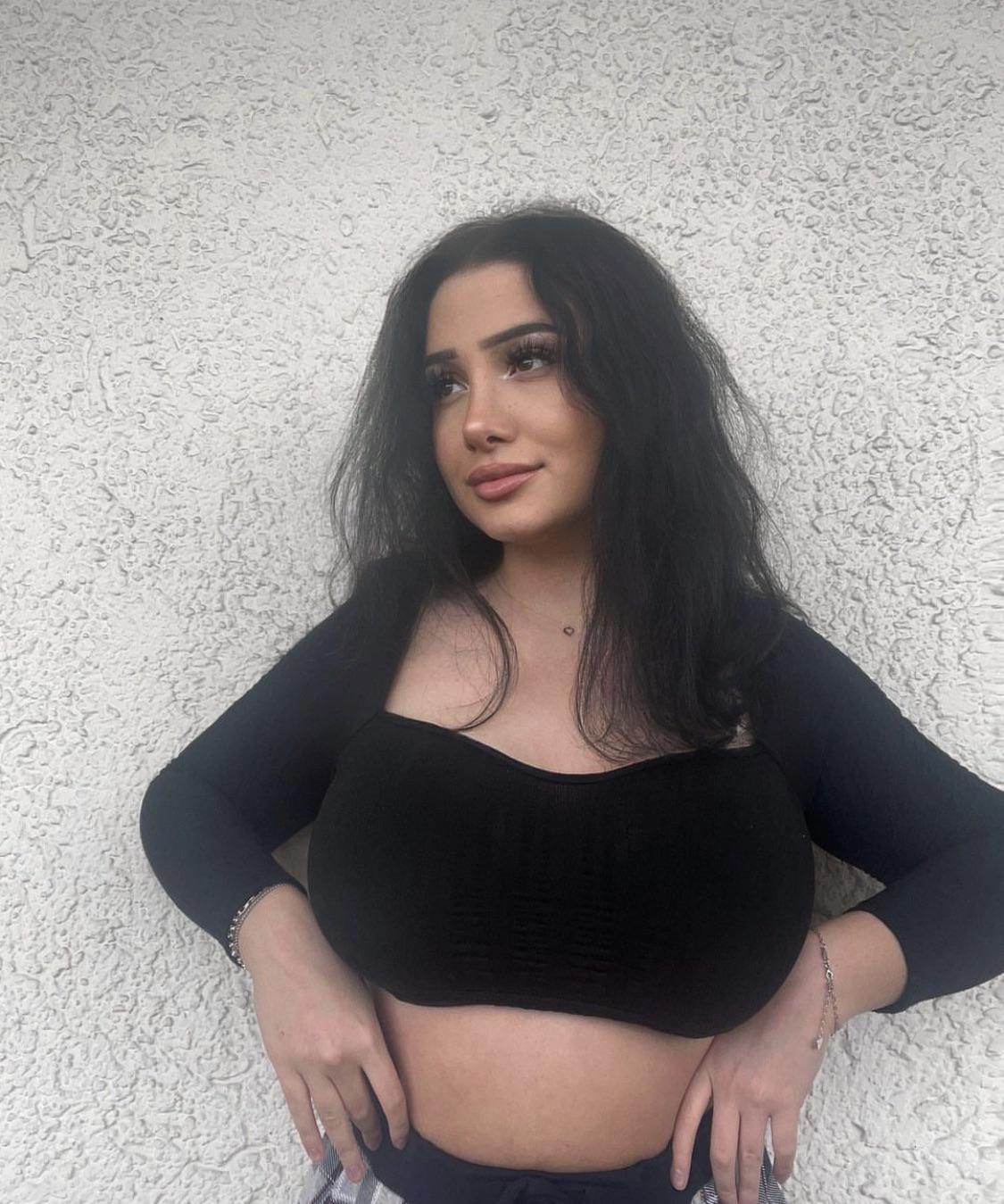 Busty in black | Scrolller