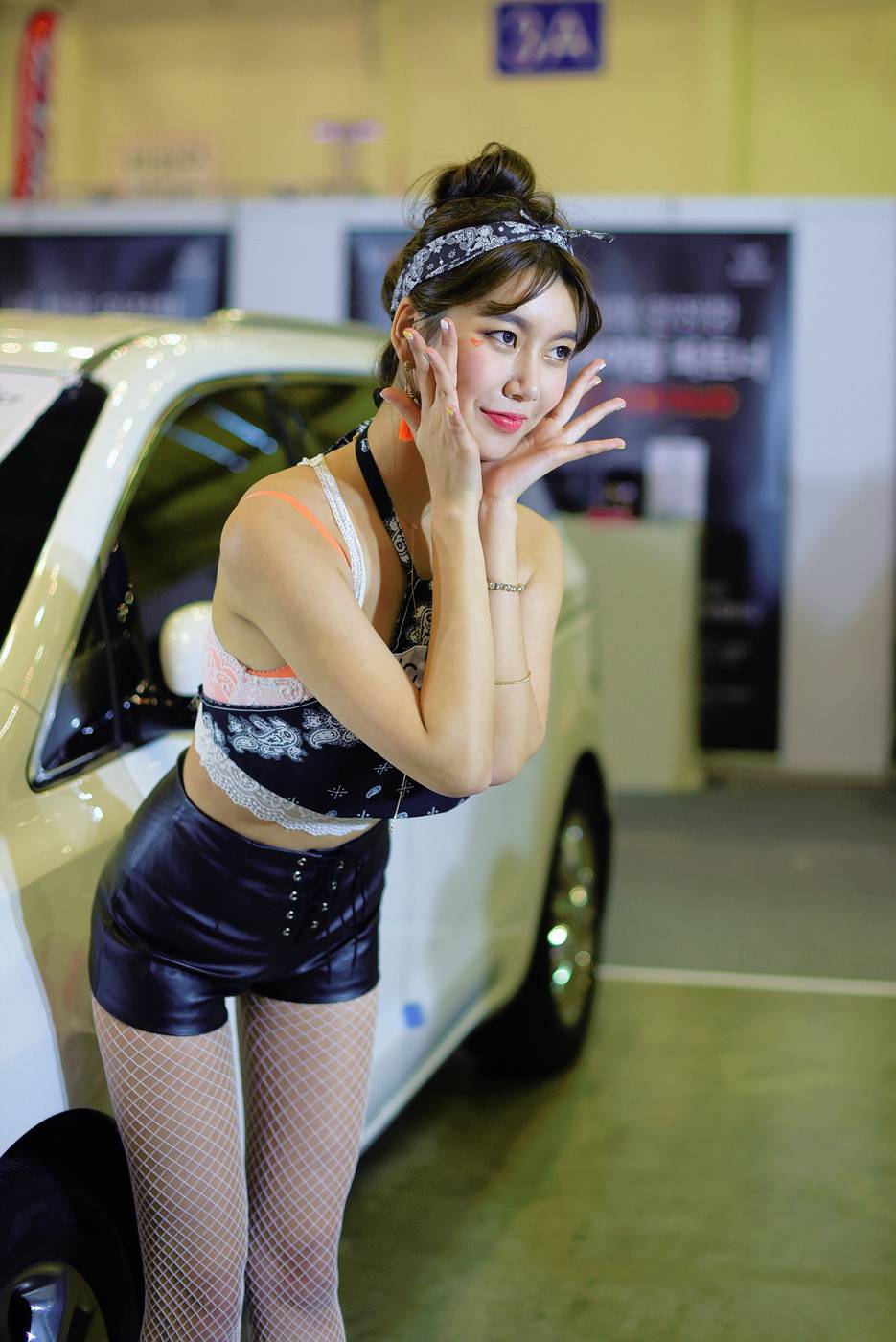 Car show girl in white fishnets | Scrolller
