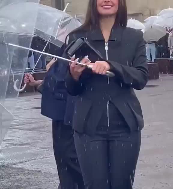 Dancing in the rain | Scrolller