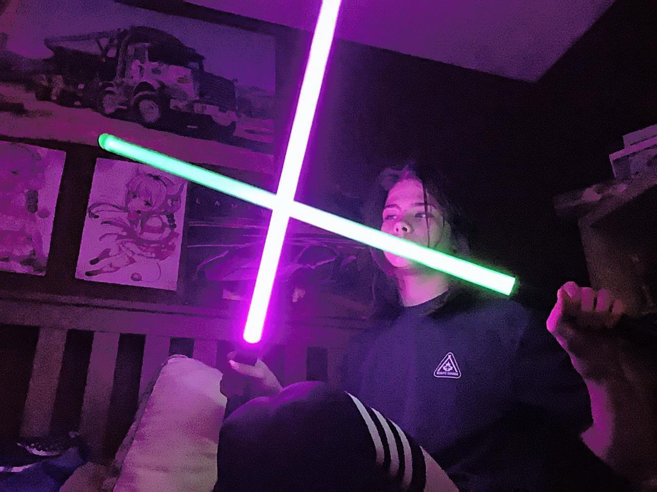 Femboy with lightsabers | Scrolller