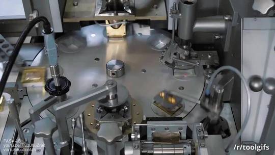 Incredible precision of a processed cheese filling and wrapping machine | Scrolller