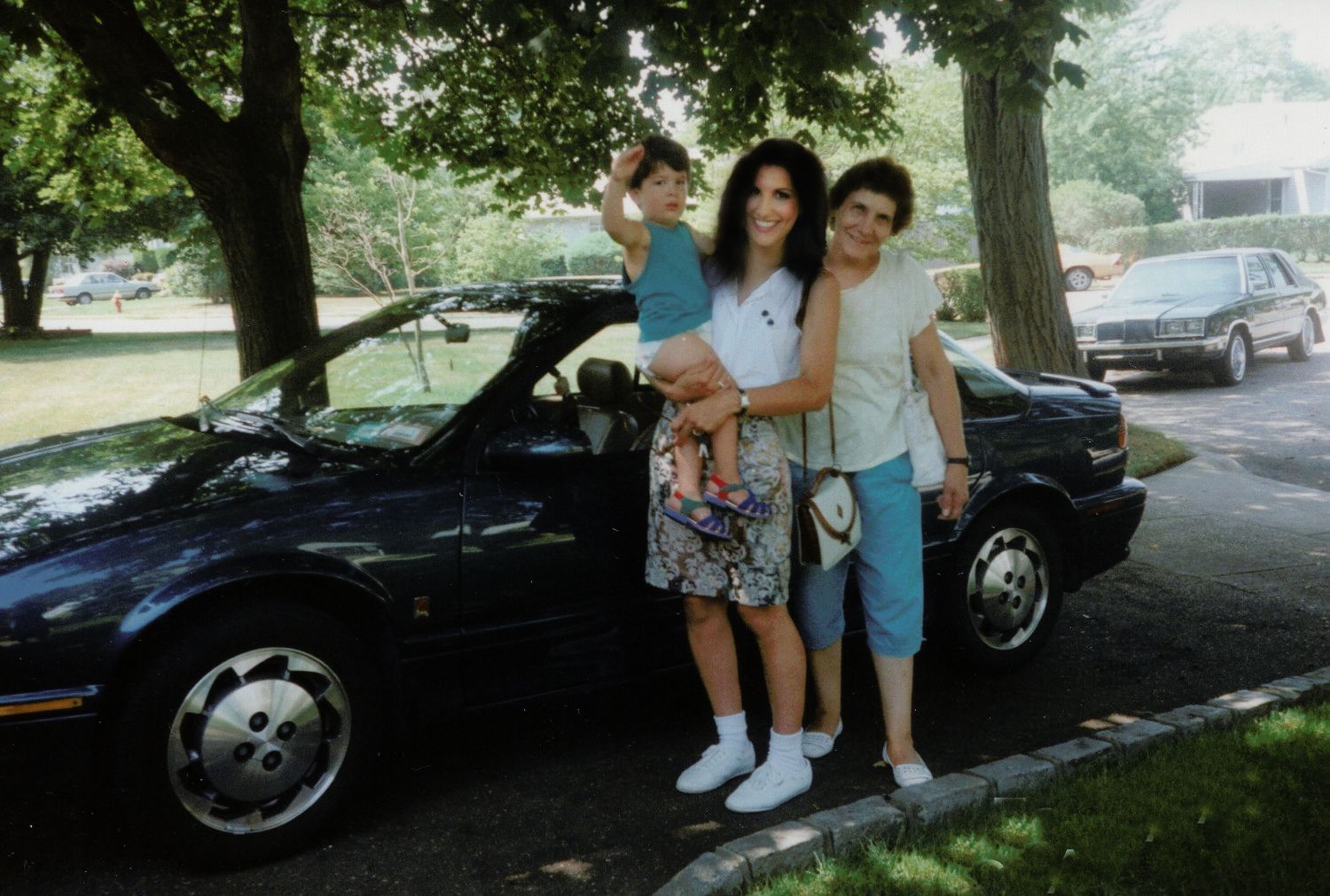 My son doing an odd hand gesture, Summer 1993 | Scrolller