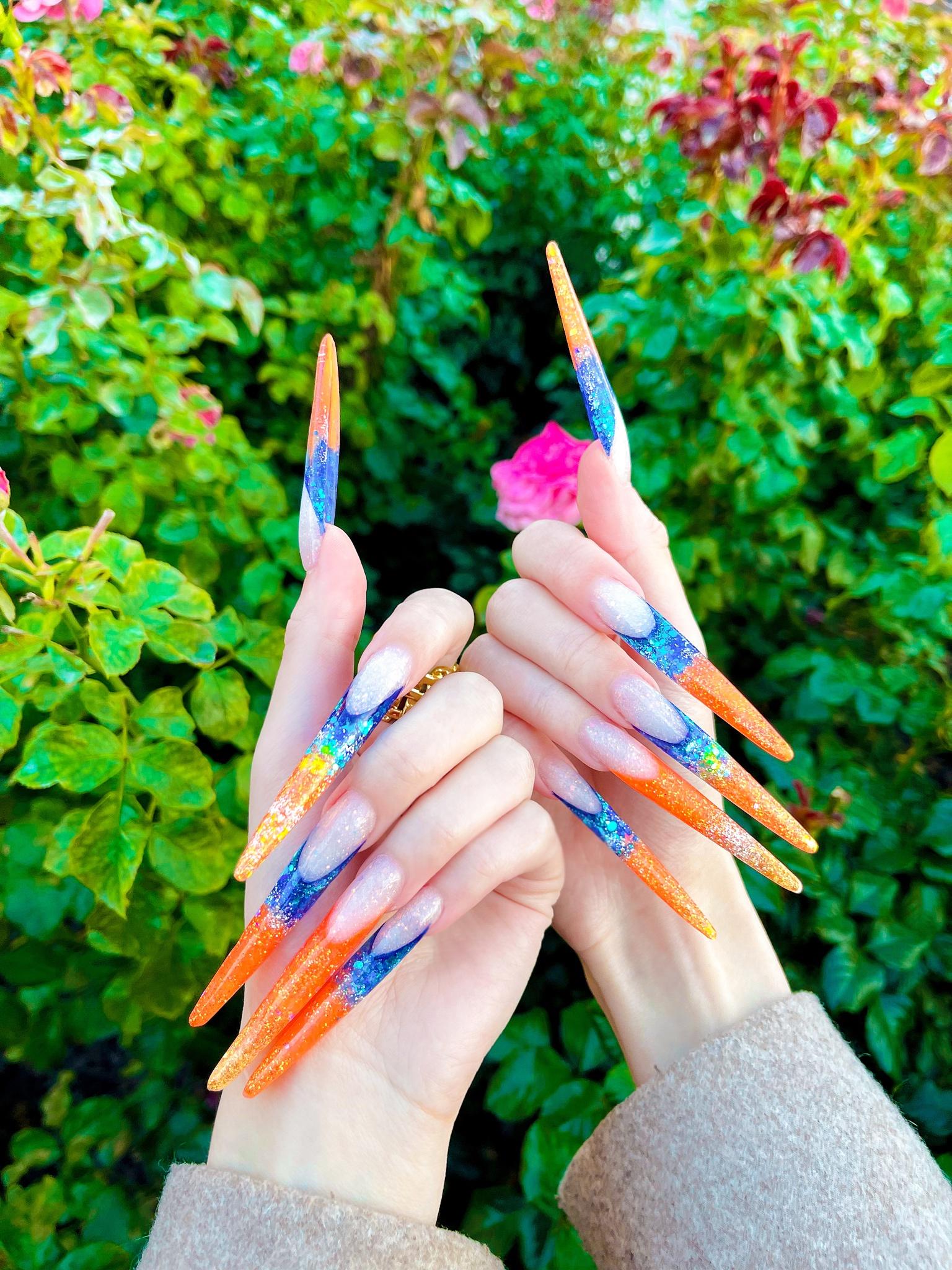 My very long orange nails | Scrolller