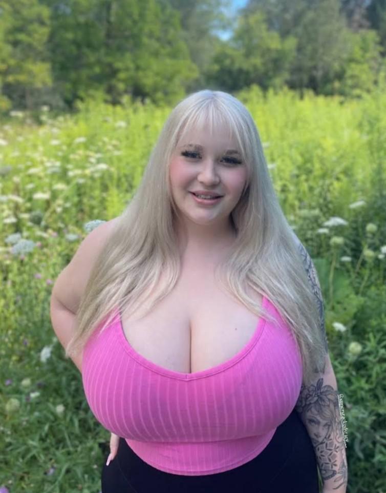 Outside buxom longhaired blonde with bangs | Scrolller