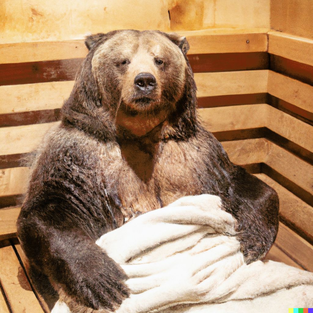 Photo of an oversized grizzly bear inside of a sauna wearing a white towel around his waist ...