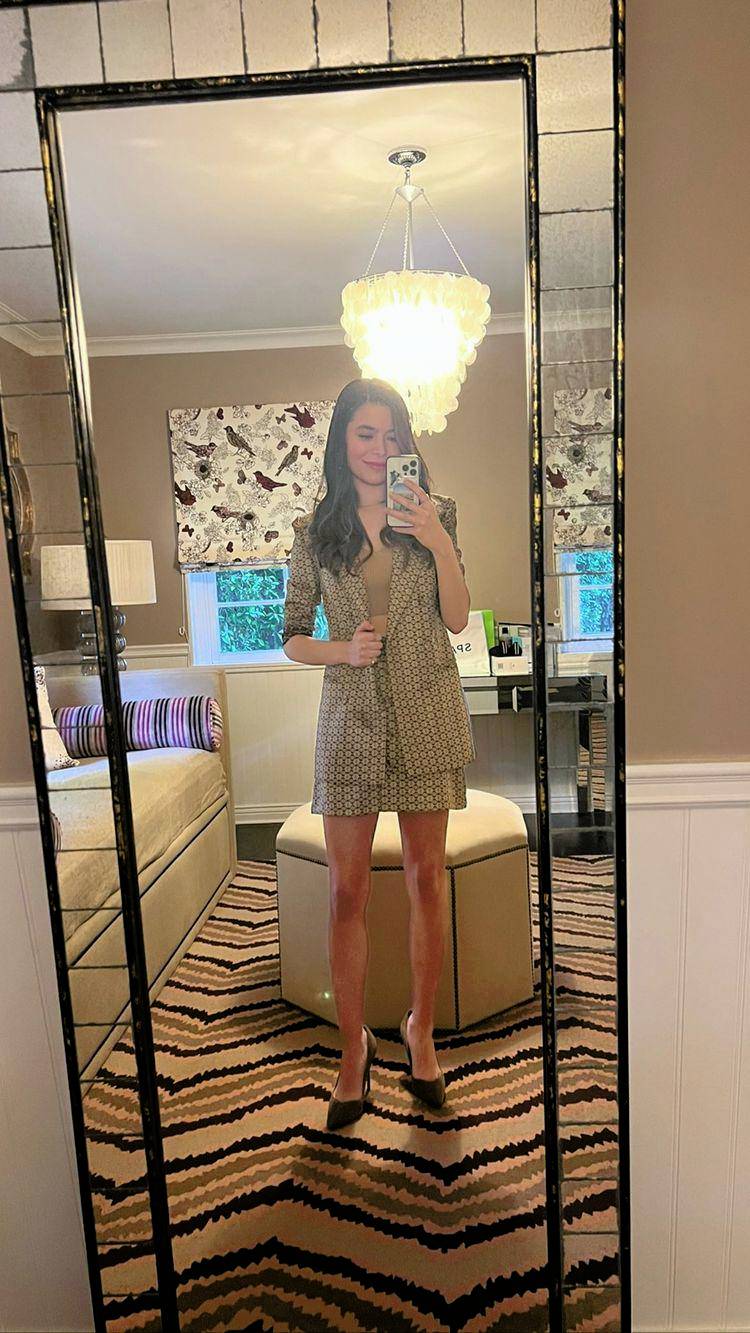 Sharp dressed woman | Scrolller