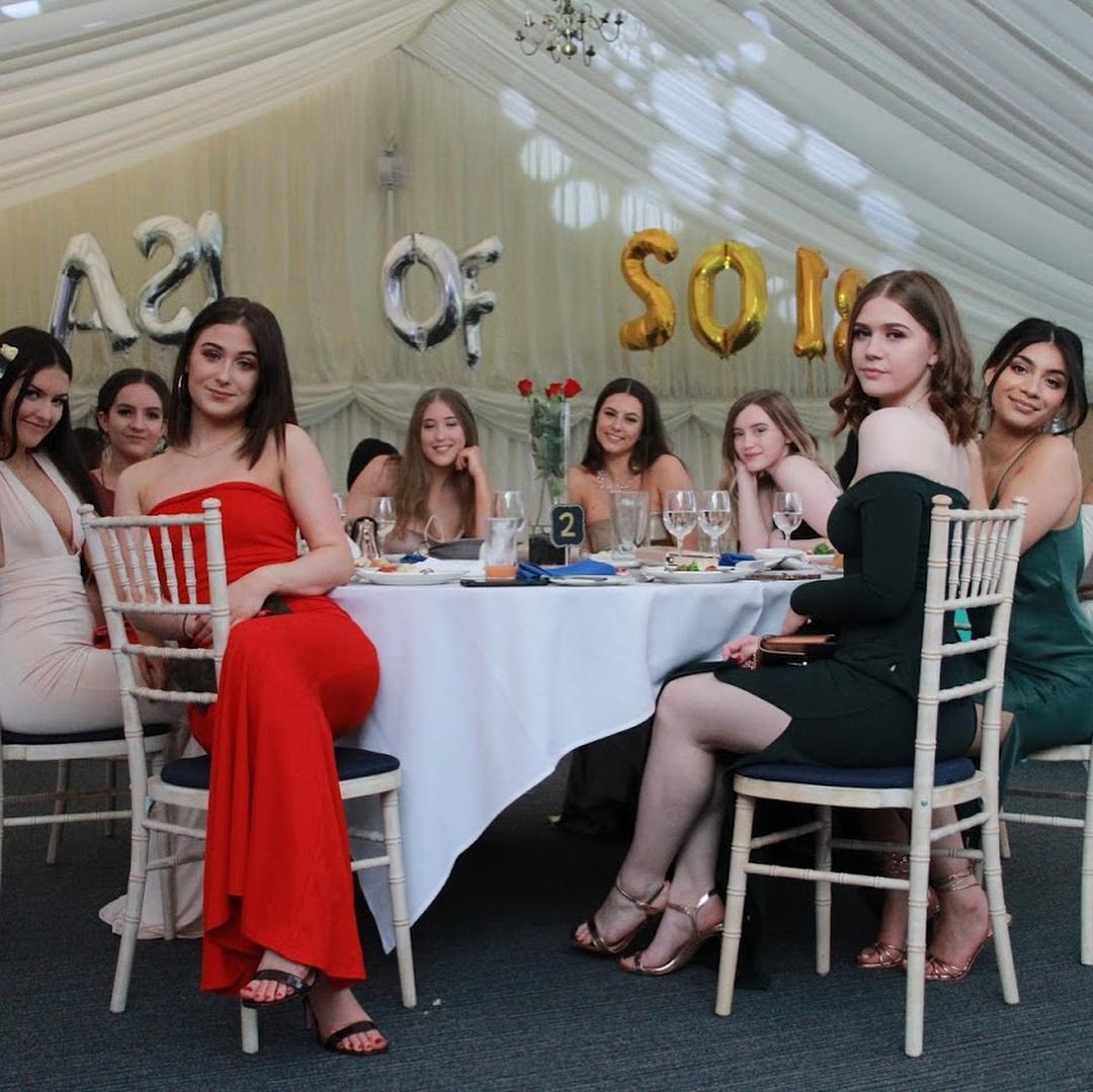 sitting down at a party | Scrolller