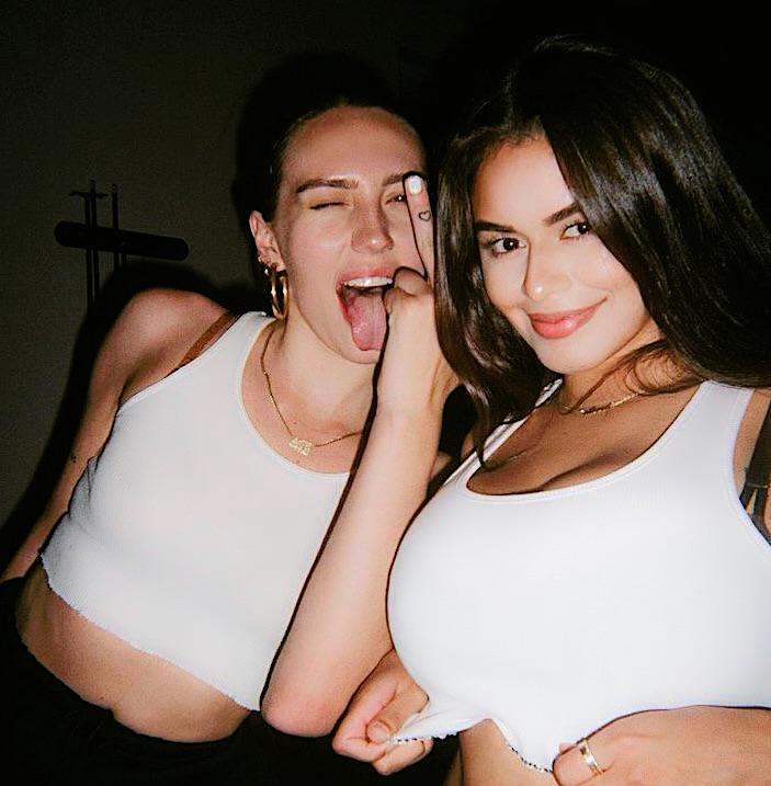 Stretching her top | Scrolller