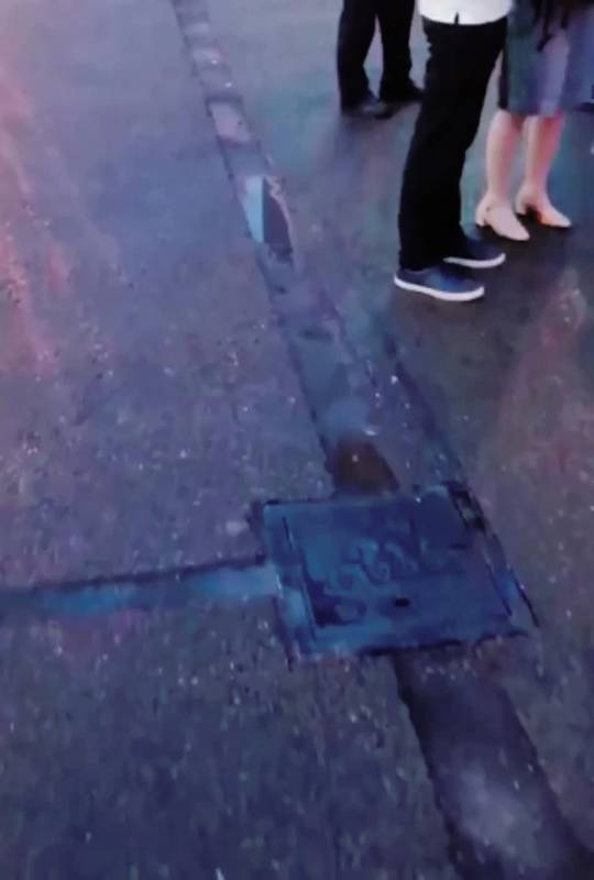 The city reflecting in this puddle | Scrolller