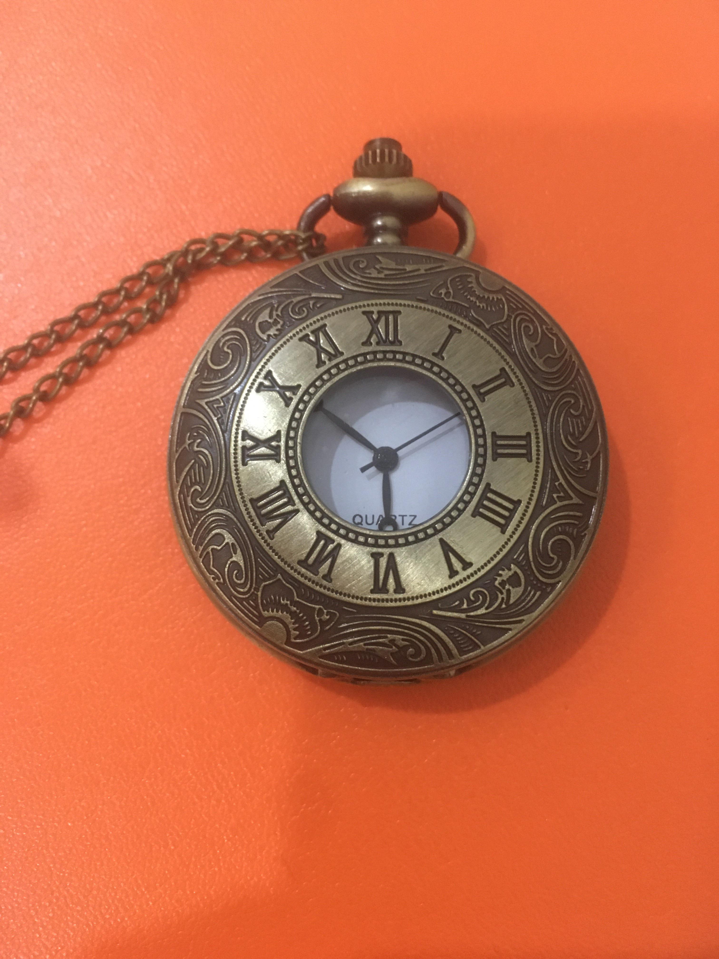 The number IIII on this pocket watch | Scrolller