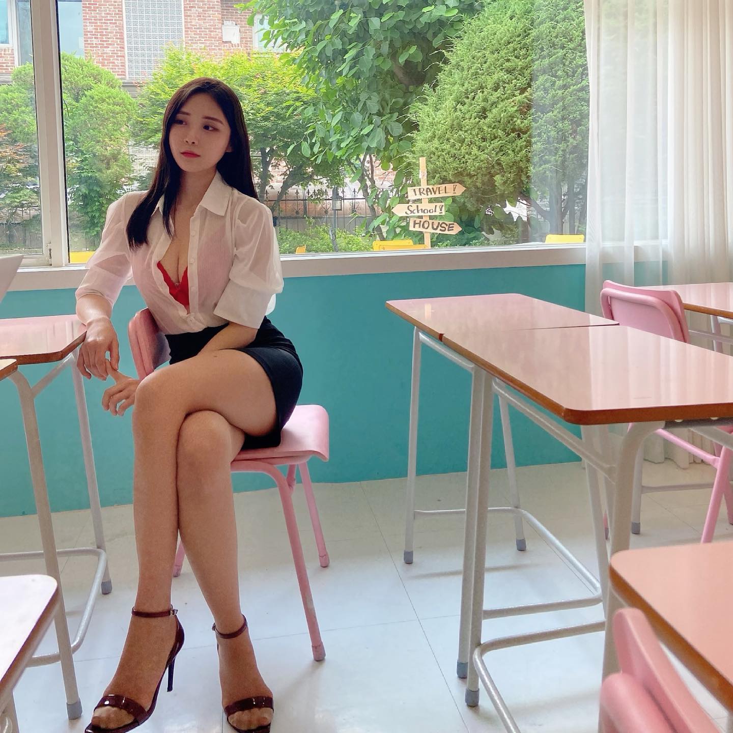 Tight skirt and cleavage on display | Scrolller