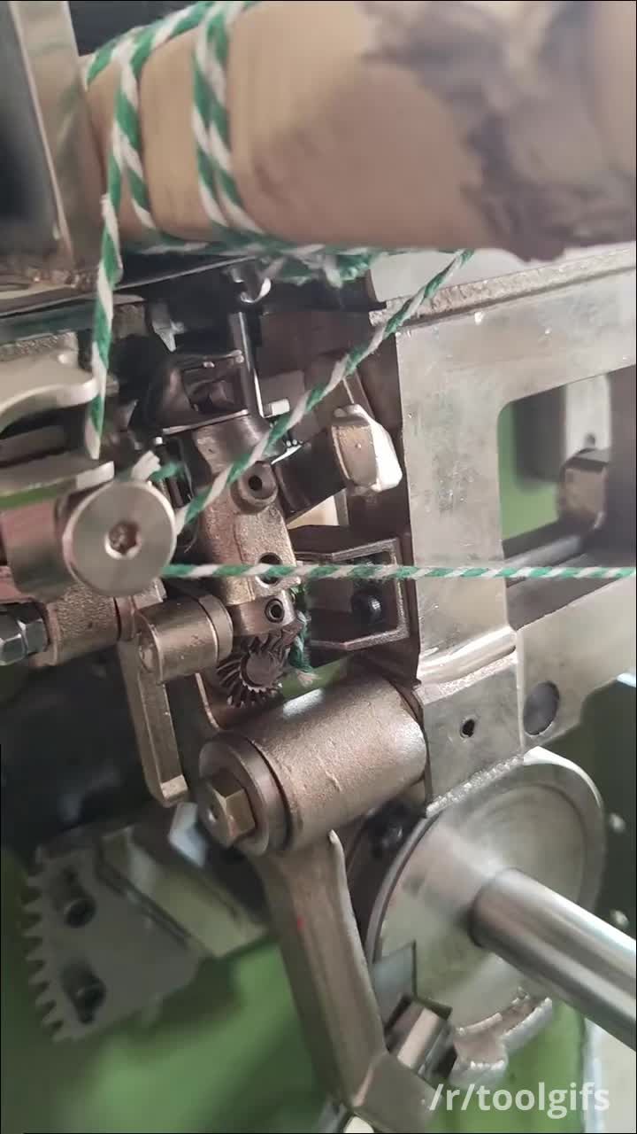 Tying machine mechanism | Scrolller