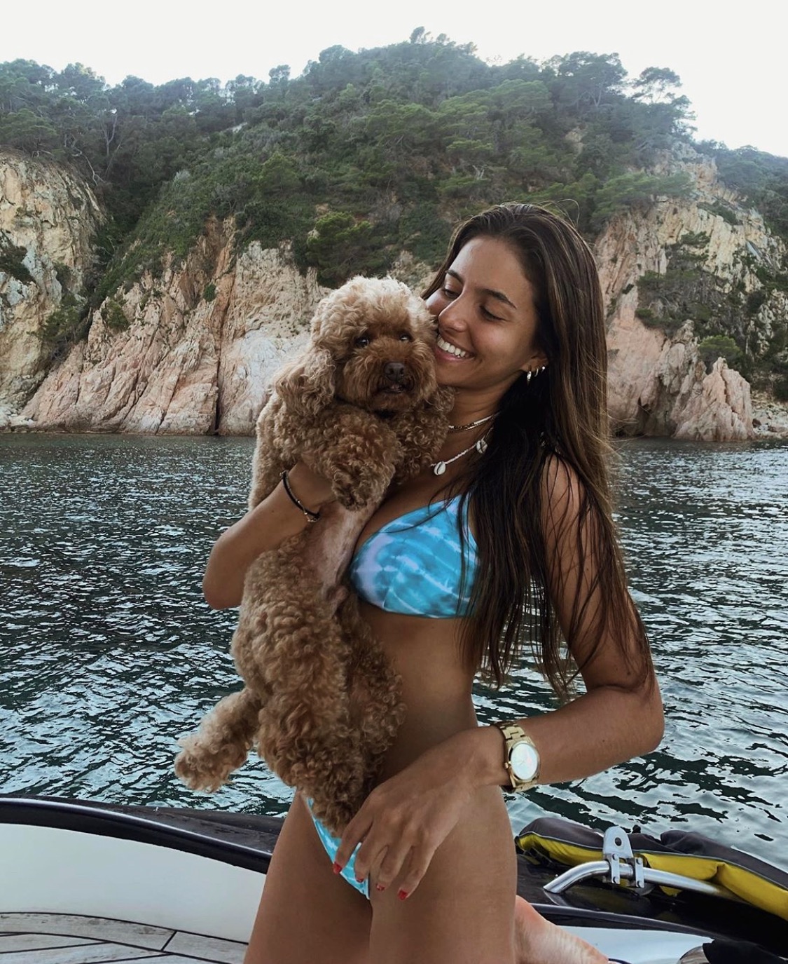 With her pup | Scrolller