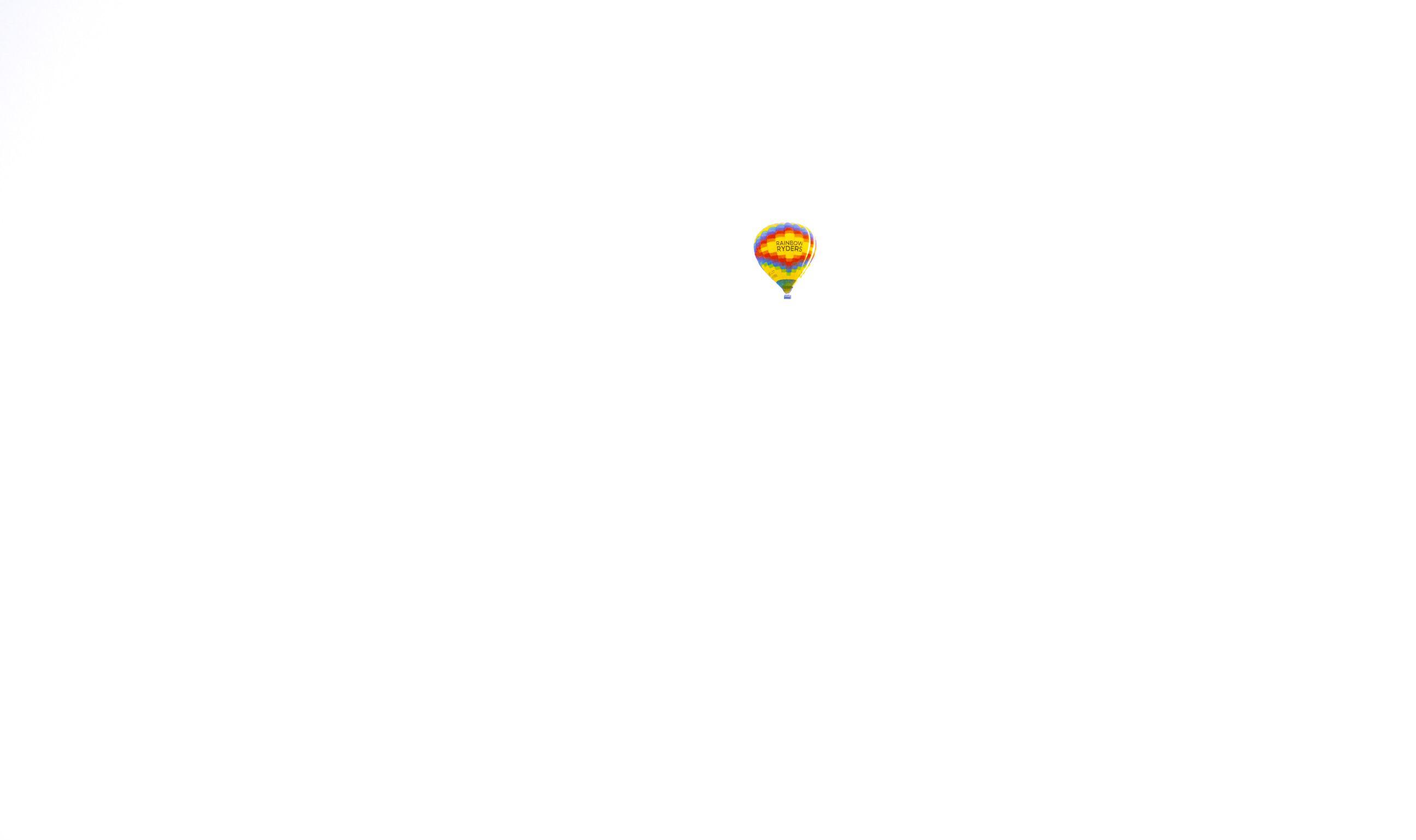 A hot air ballon, floating along | Scrolller
