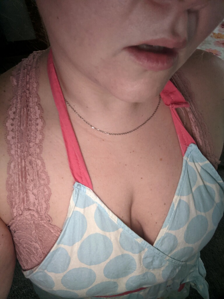 A little peak of cleavage under my apron | Scrolller