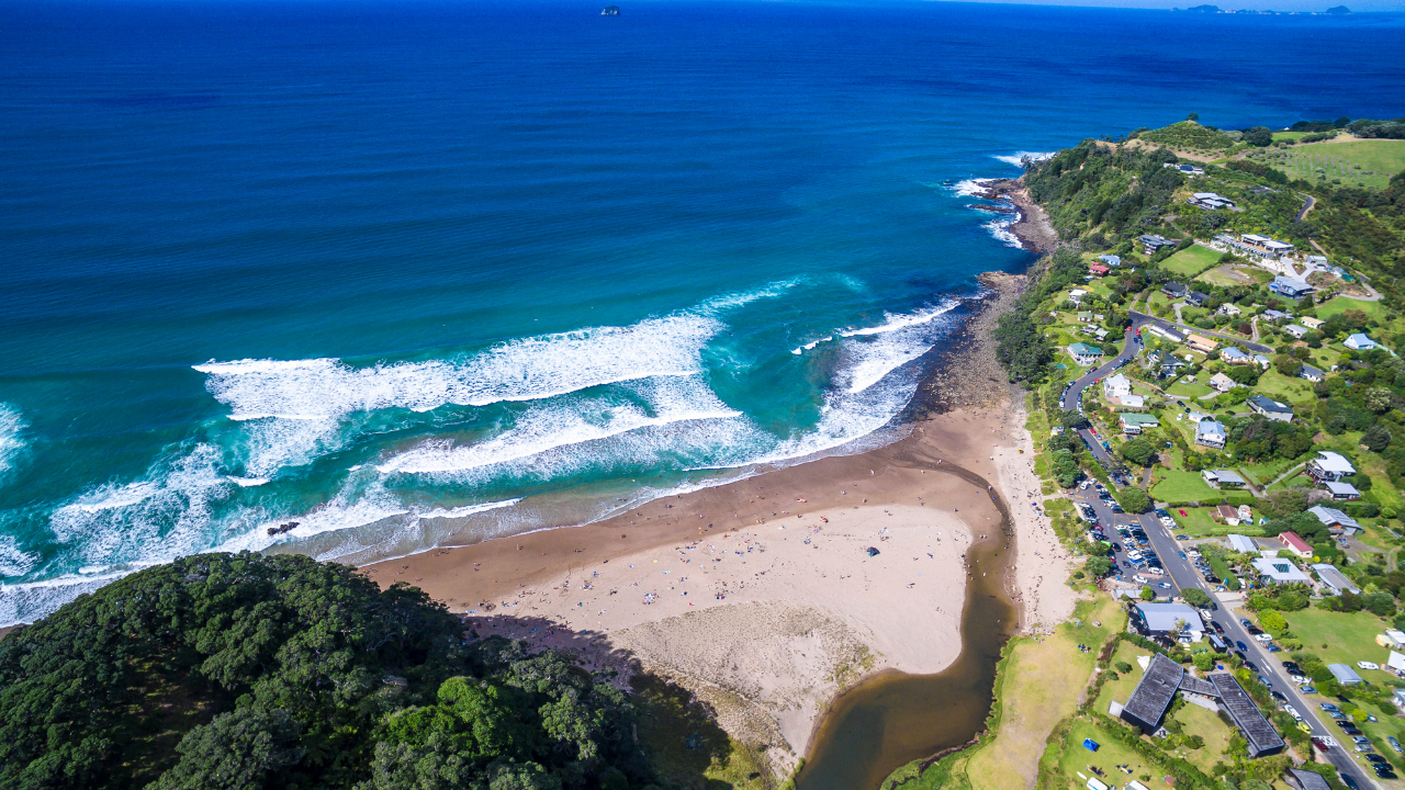 Aerial view of Hot Water Beach, Coromandel / New Zealand | Scrolller