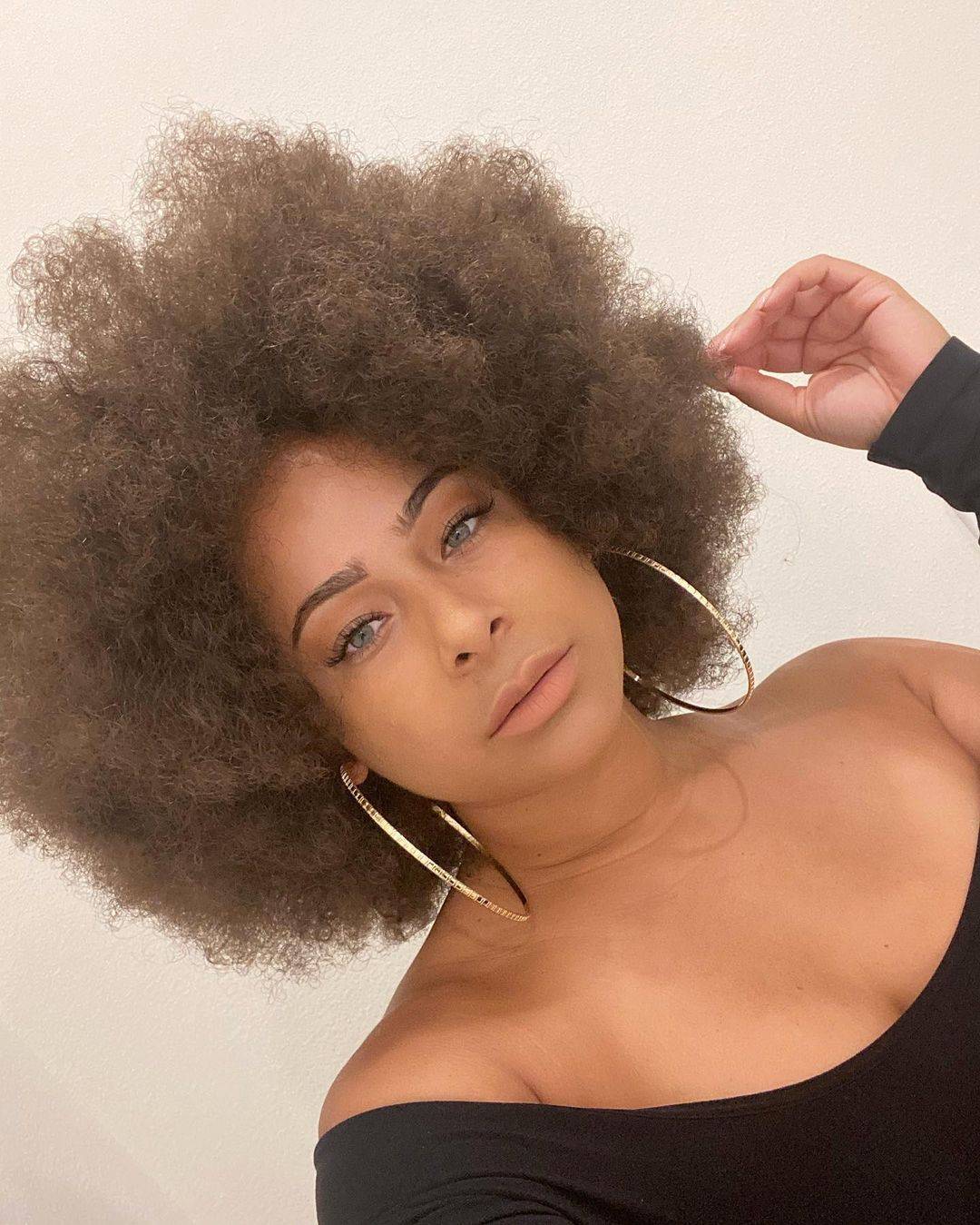 Afro Sheek | Scrolller