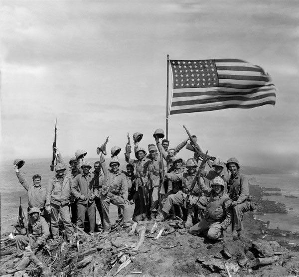After Raising the Flag on Iwo Jima | Scrolller