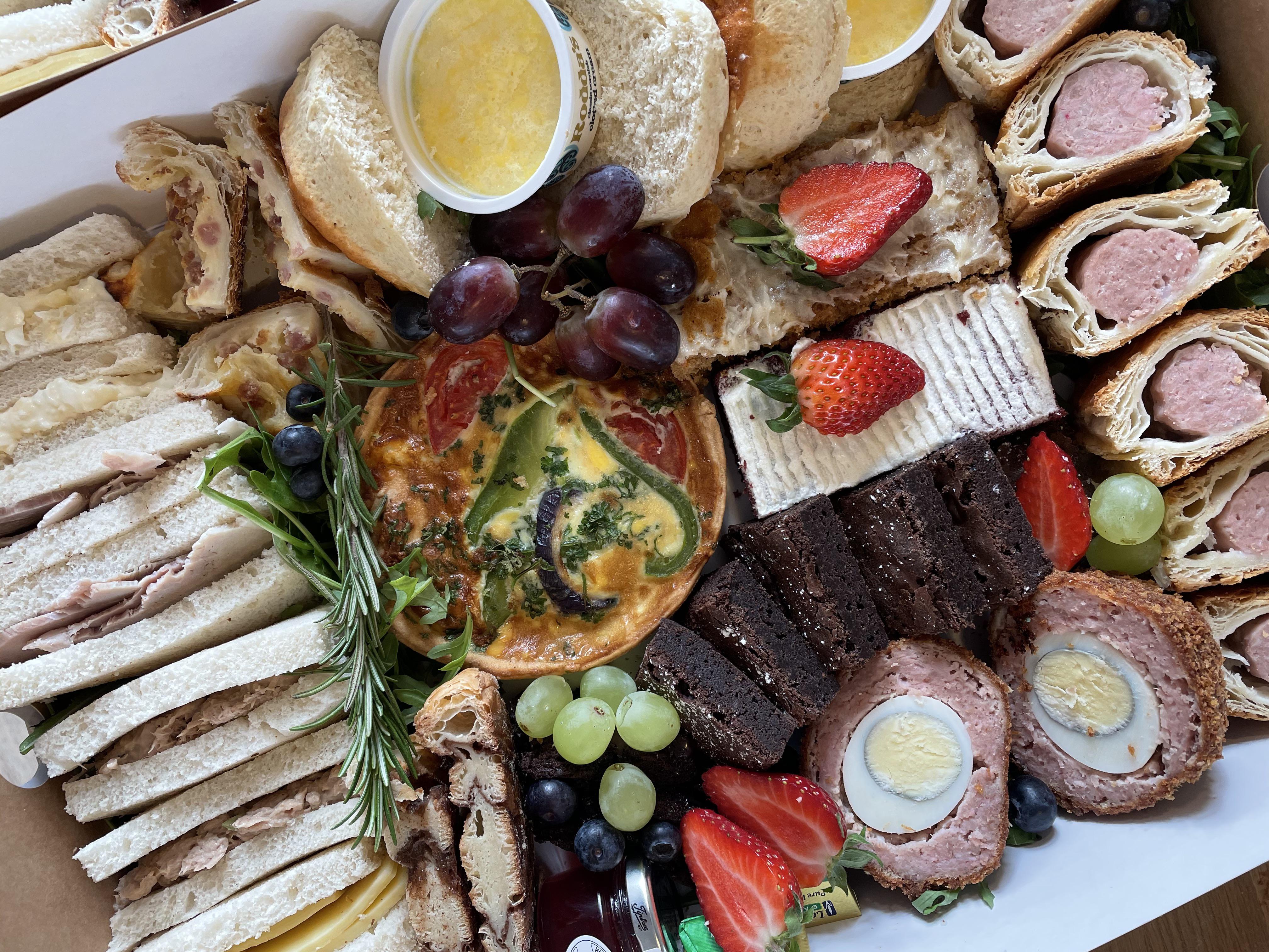 Afternoon Tea ~ Finger sandwhiches, scotch egg, scones, carrot cake, brownie, cinnamon bun ...