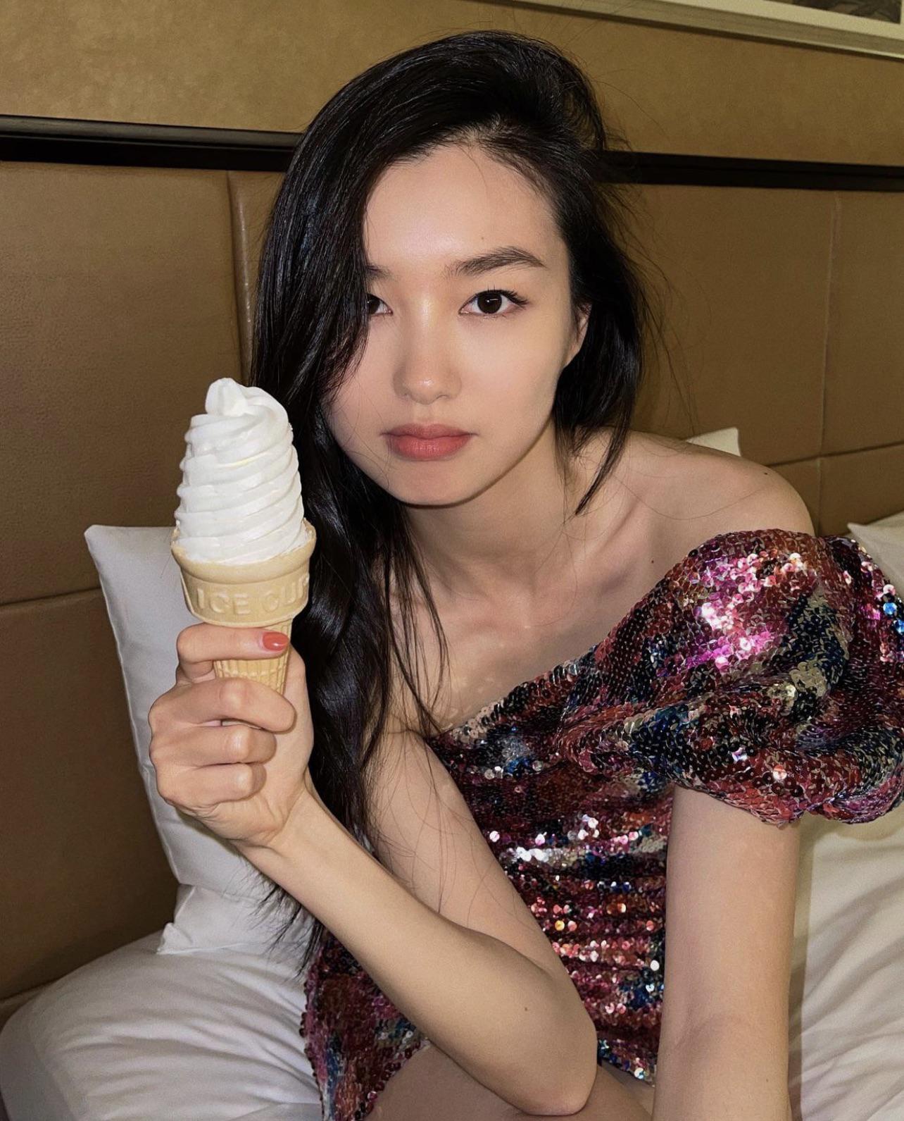 All innocent with her ice cream | Scrolller