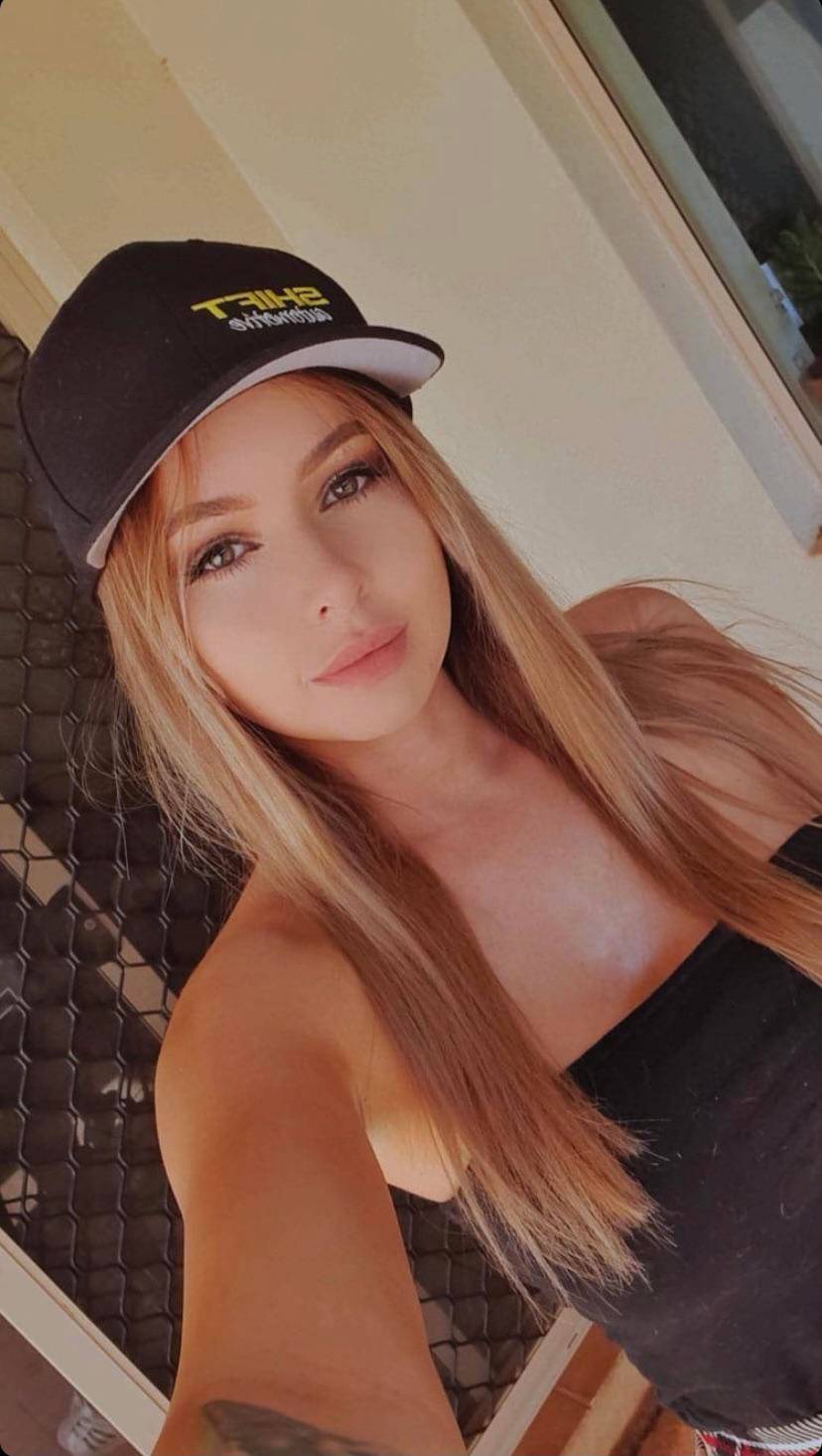 Amy in a ball cap | Scrolller