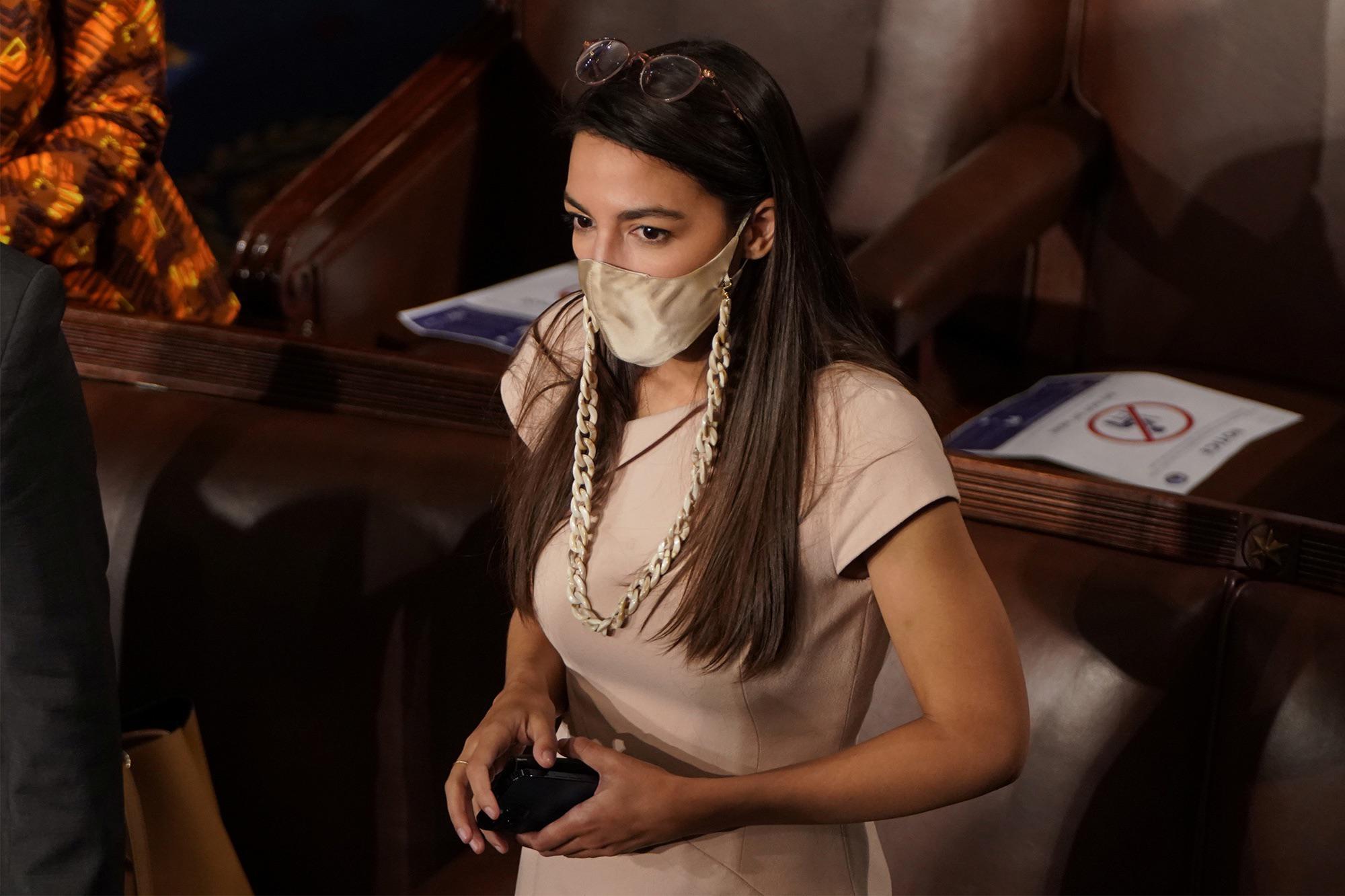 AOC in another tight dress, showing you the goods | Scrolller