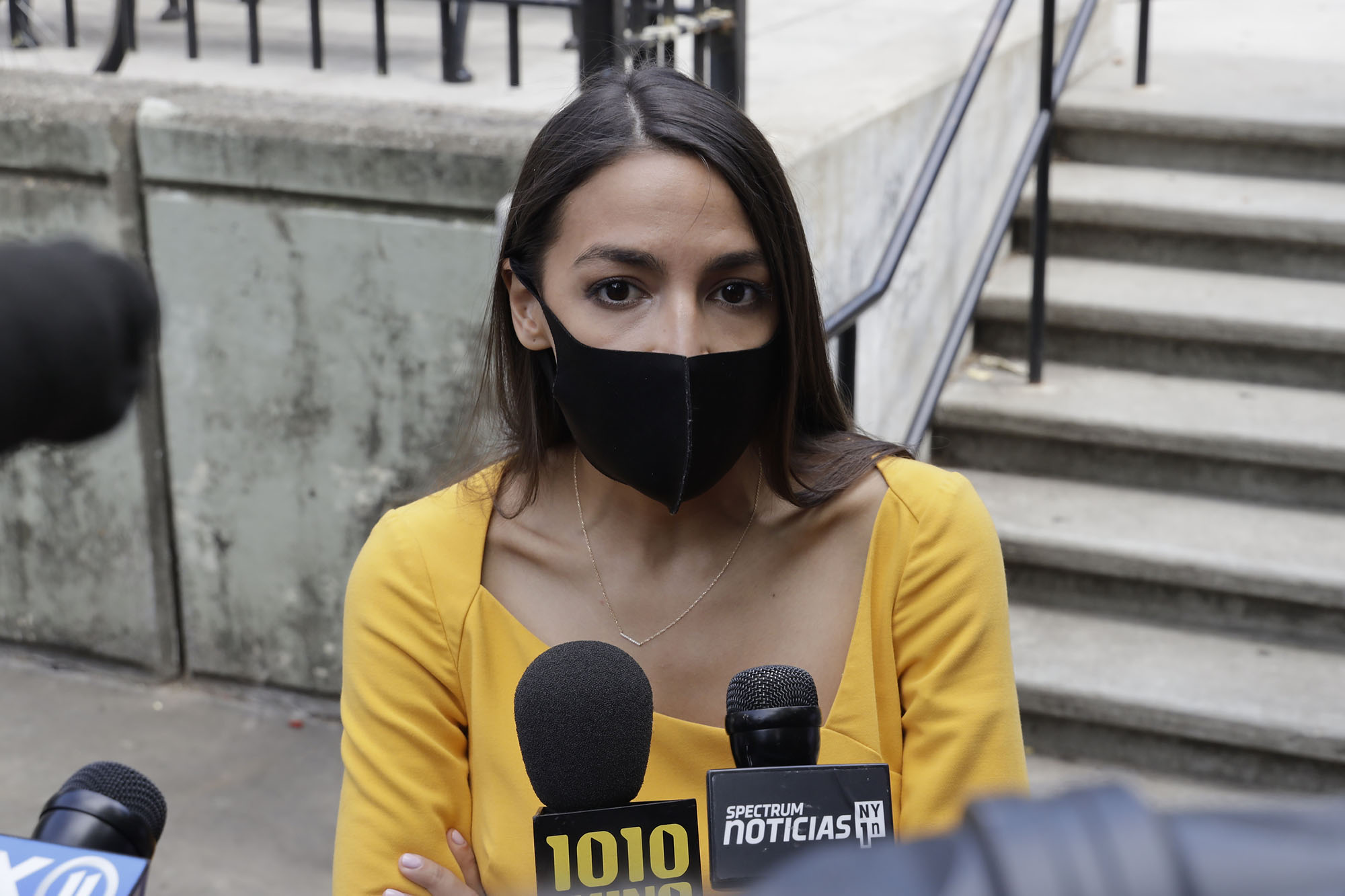 AOC looking cute in yellow | Scrolller