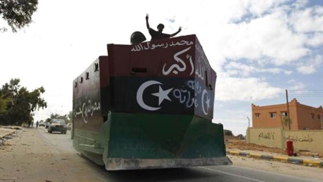 Armored bulldozer painted with Libyan flag | Scrolller