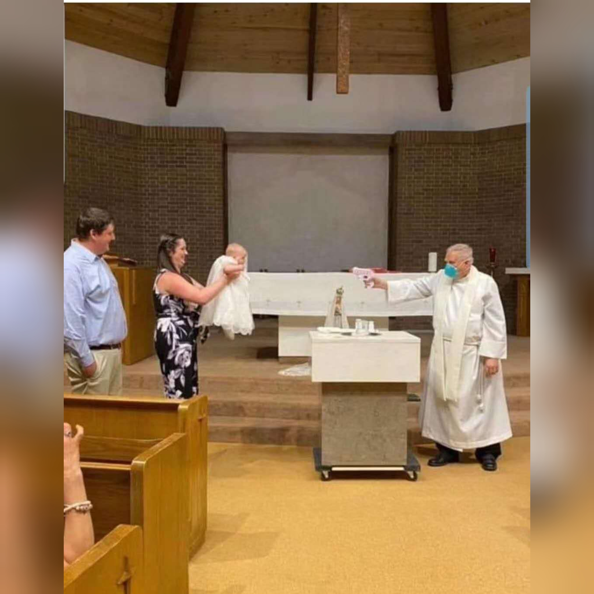 Baptism by water pistol | Scrolller