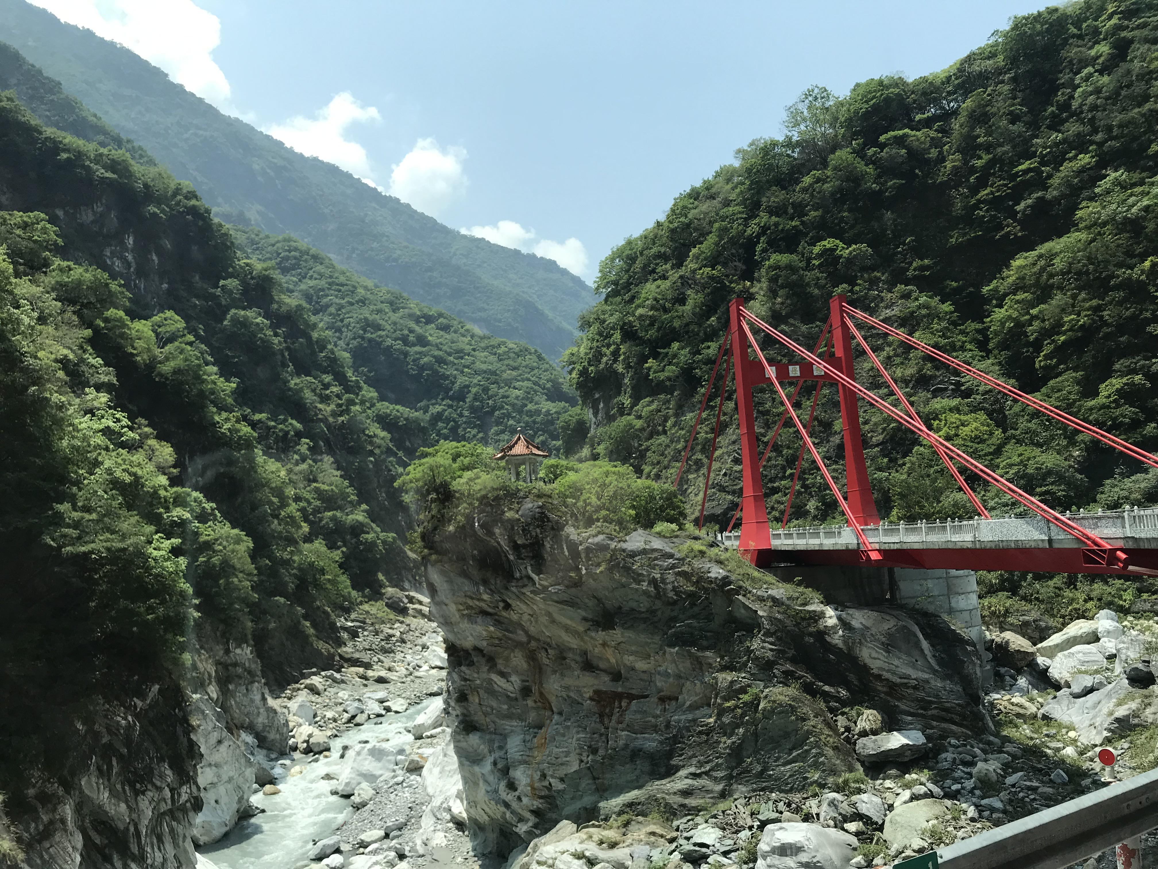 Big red bridge and small pagoda | Scrolller