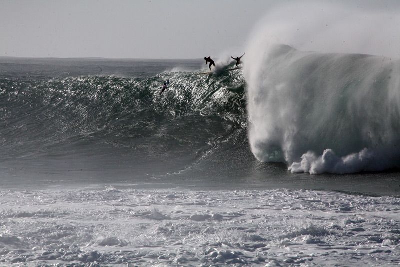 Big wave surf contest at Waimea Bay, Oahu | Scrolller