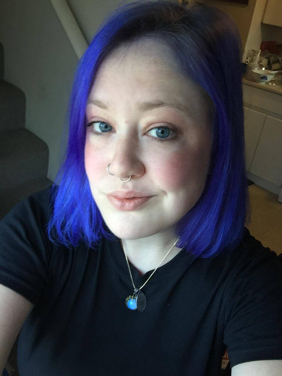 Blue eyes and purple hair. Who doesn’t like a colour combo? | Scrolller