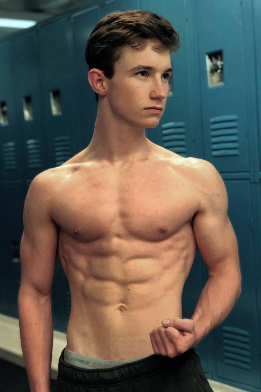 Boy Flexing | Scrolller