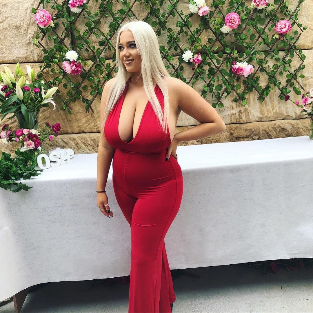 Bursting out her jumpsuit | Scrolller