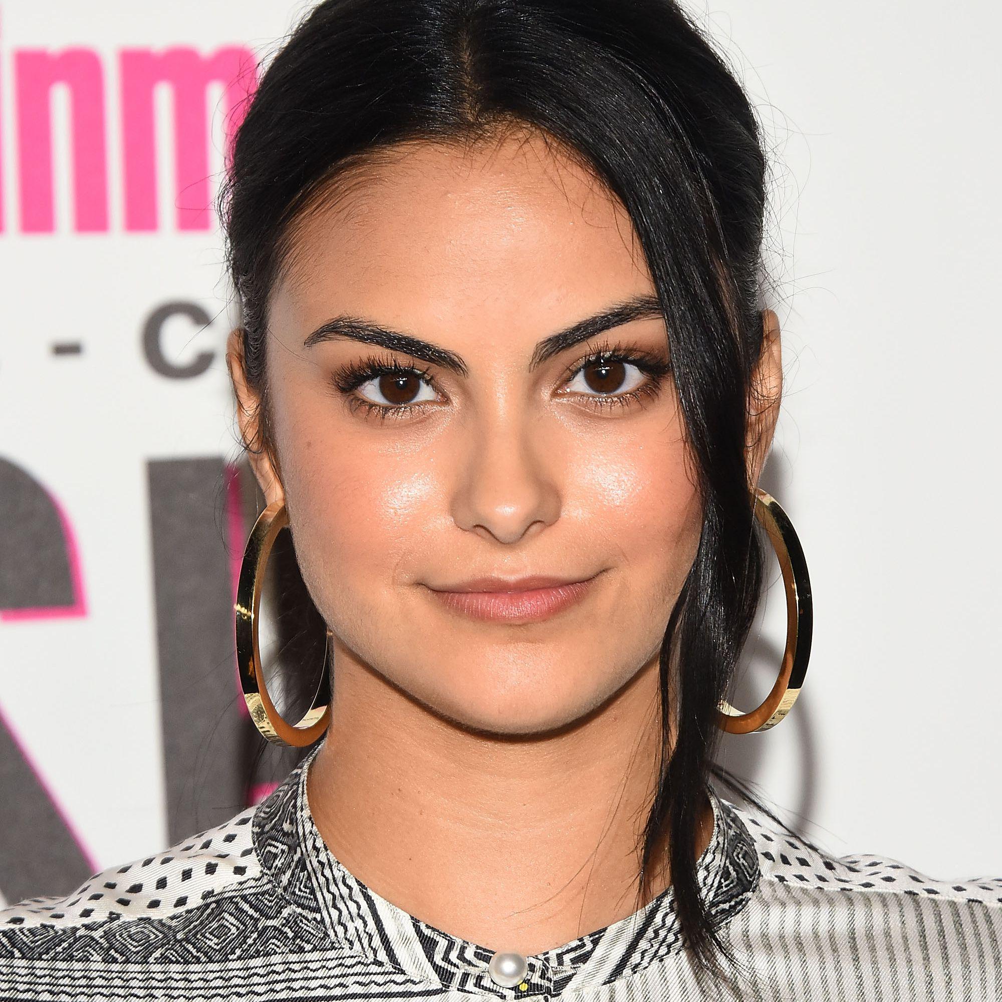 Camila Mendes looking lovely with big hoop earrings | Scrolller