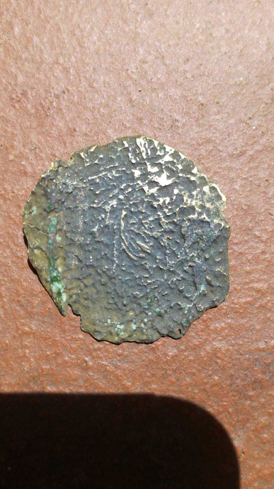 Can anyone help identify this coin? I realise it's a longshot as it is very worn! | Scrolller