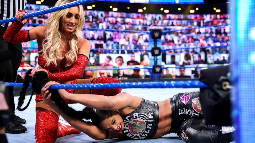 Carmella trapping Bianca Belair in the ropes | Scrolller