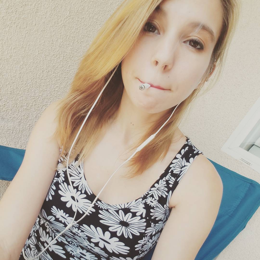 Cece Capella smokes and tunes | Scrolller