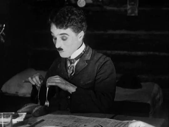 Charlie Chaplin's famous dance of the rolls from The Gold Rush (1925) | Scrolller