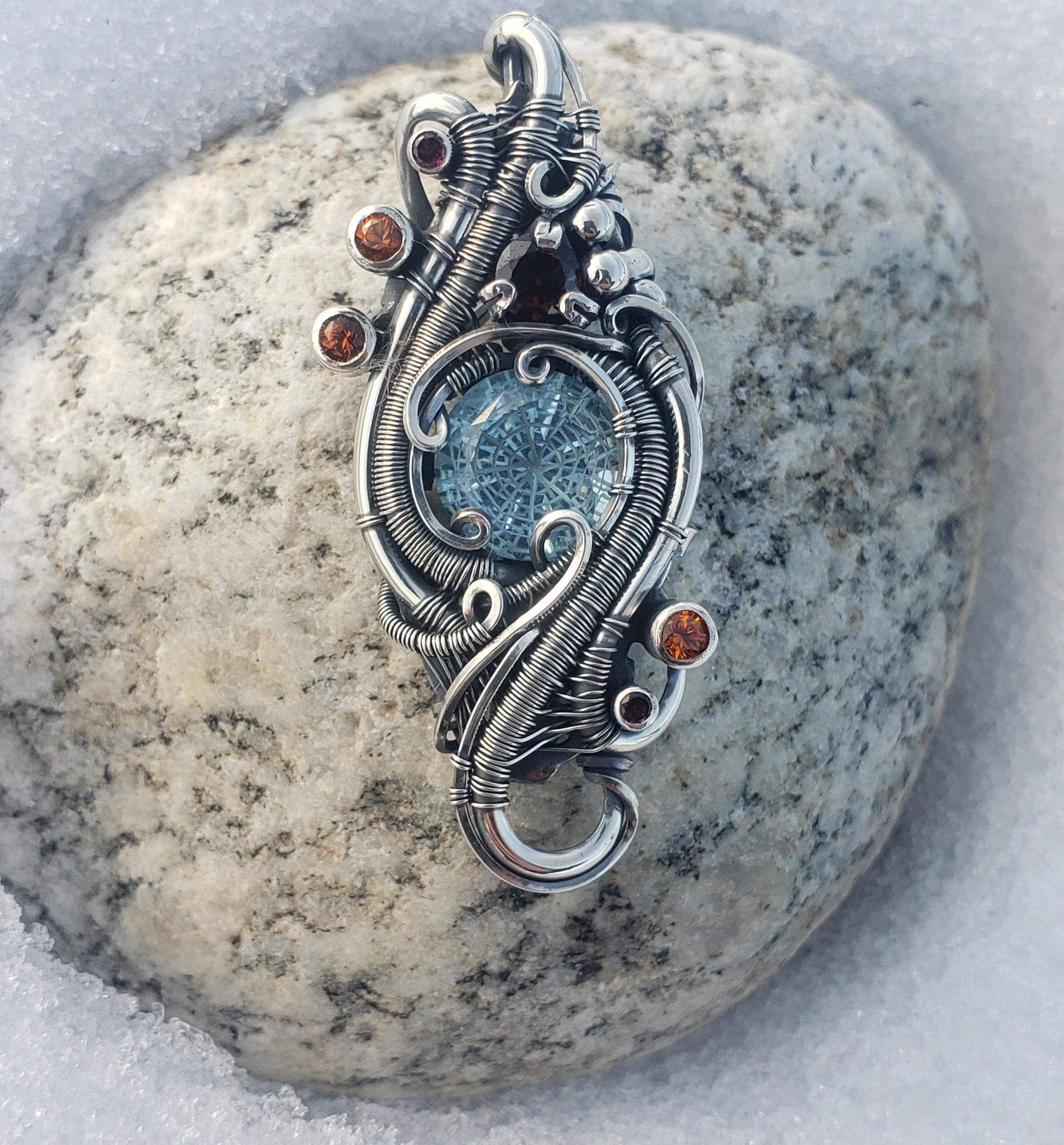 Check out this spiders web carved topaz! | Scrolller