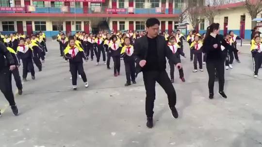 Chinese school principal teaches students shuffle dance during break | Scrolller