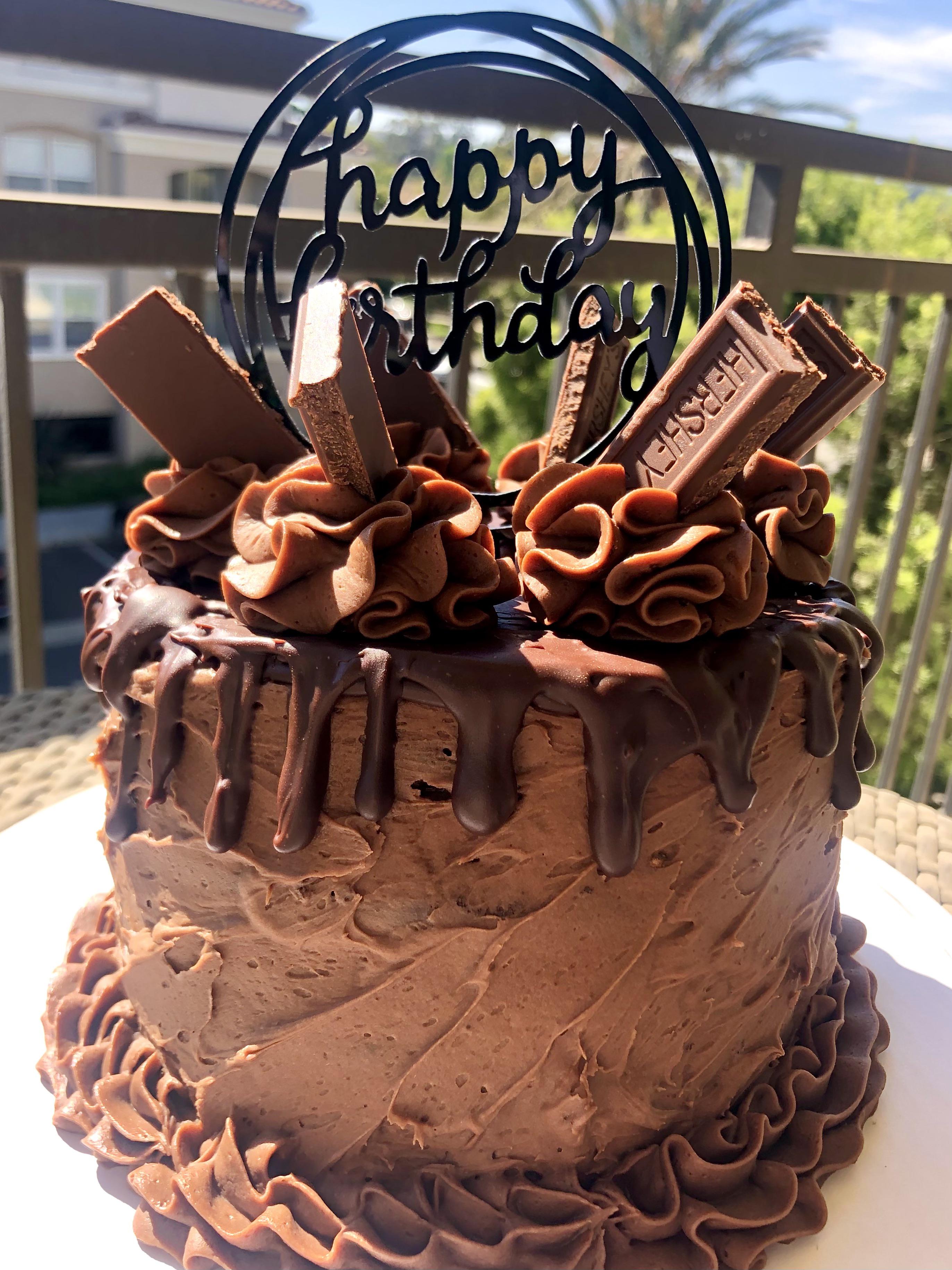 Chocolate chocolate chocolate cake with whoppers in the center | Scrolller